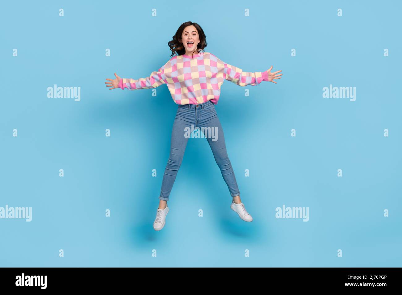 Full size photo of young excited lovely girl have fun jump up travel ...