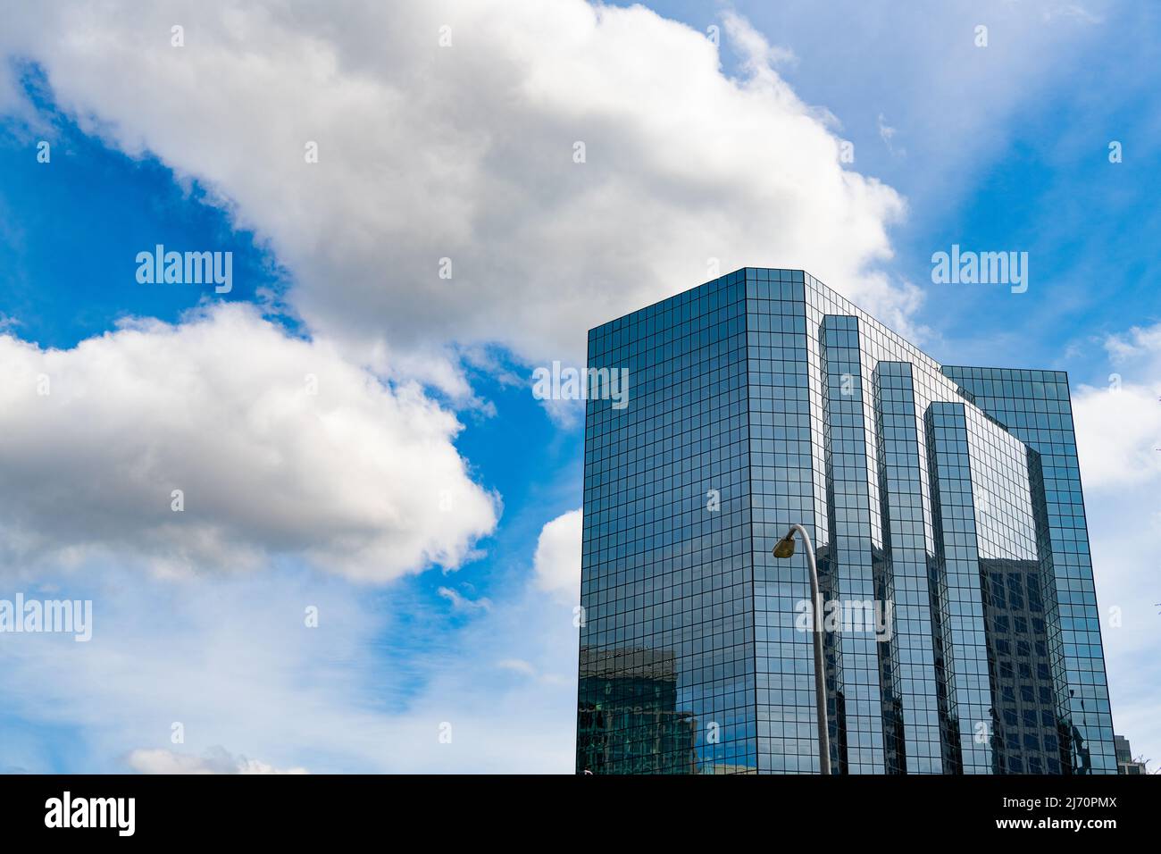 modern glassy skyscraper buildings. business center in modern city with ...