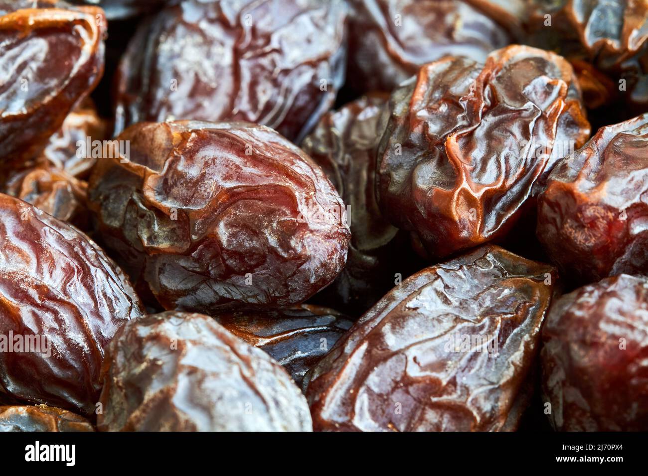 Organic dried dates close-up as vegetarian food background Stock Photo ...