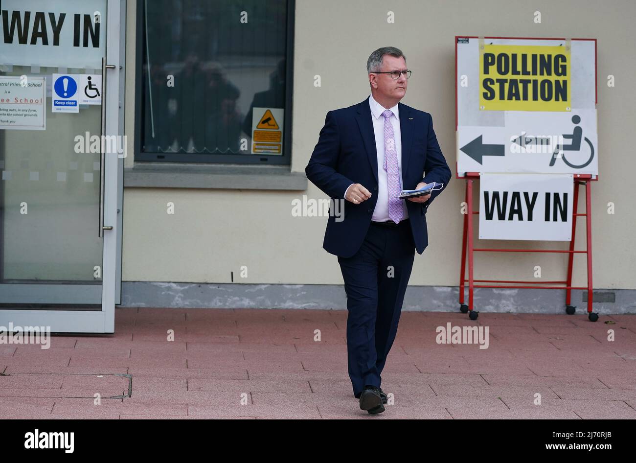 Democratic Unionist leader Sir Jeffrey Donaldson leaving the polling ...