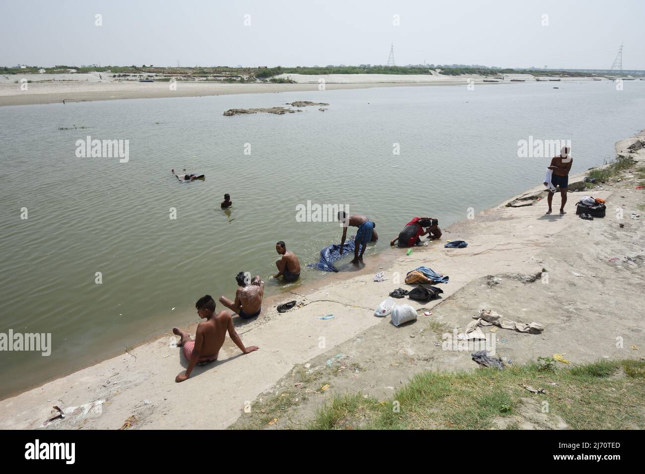 Bathing people in the Ganges at Guptar Ghat or Narayan Ghat. Civil Lines, Kanpur, Uttar Pradesh ...