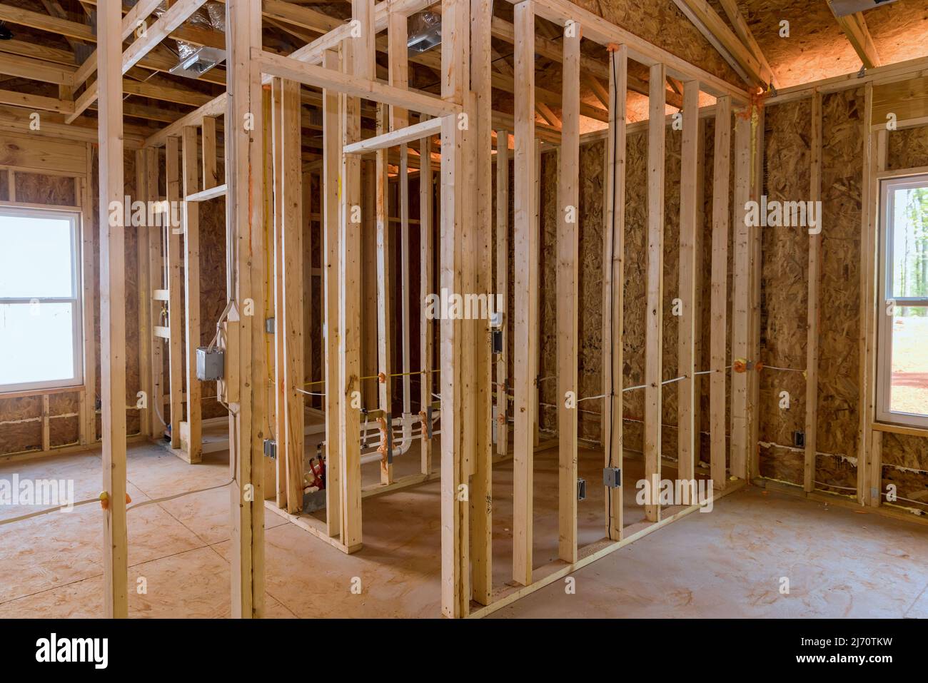 View new home under construction framing of beams stick built building ...