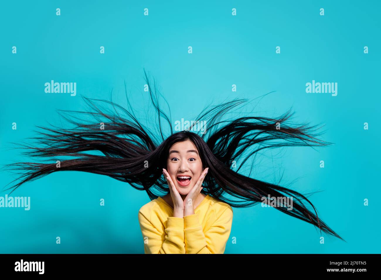 Photo of charming impressed lady dressed yellow sweater arms cheeks ...