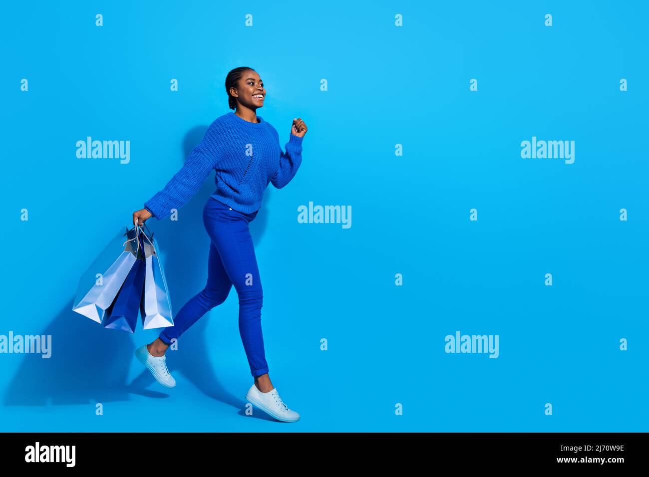 Full length body size view of attractive cheerful girl jumping running ...