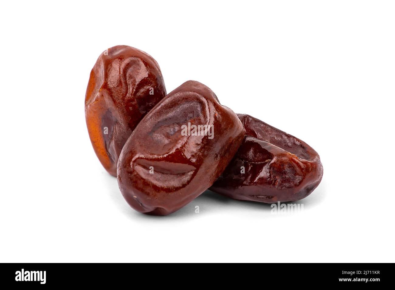 Dried fruits. Dates in close-up, isolated on a white background Stock ...