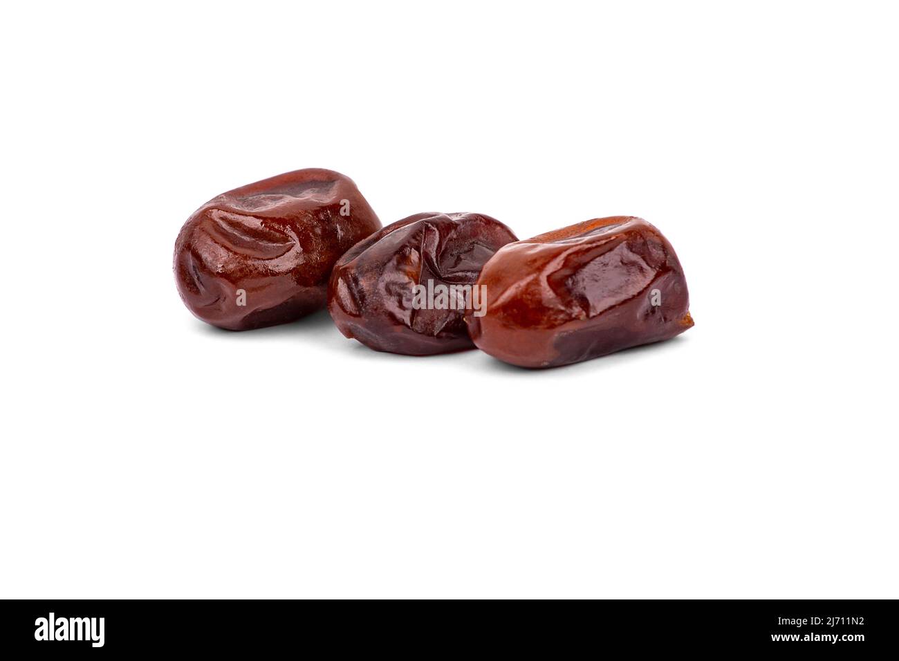 Dried fruits. Dates in close-up, isolated on a white background Stock ...
