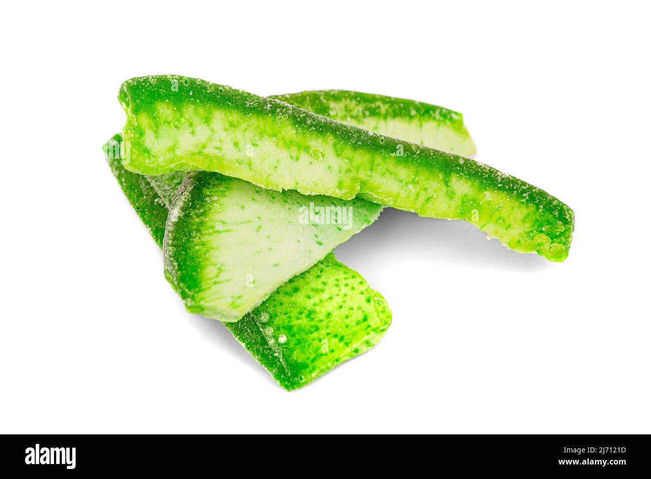 Dried fruits. Dried pomelo slices in close-up, isolated on a white ...