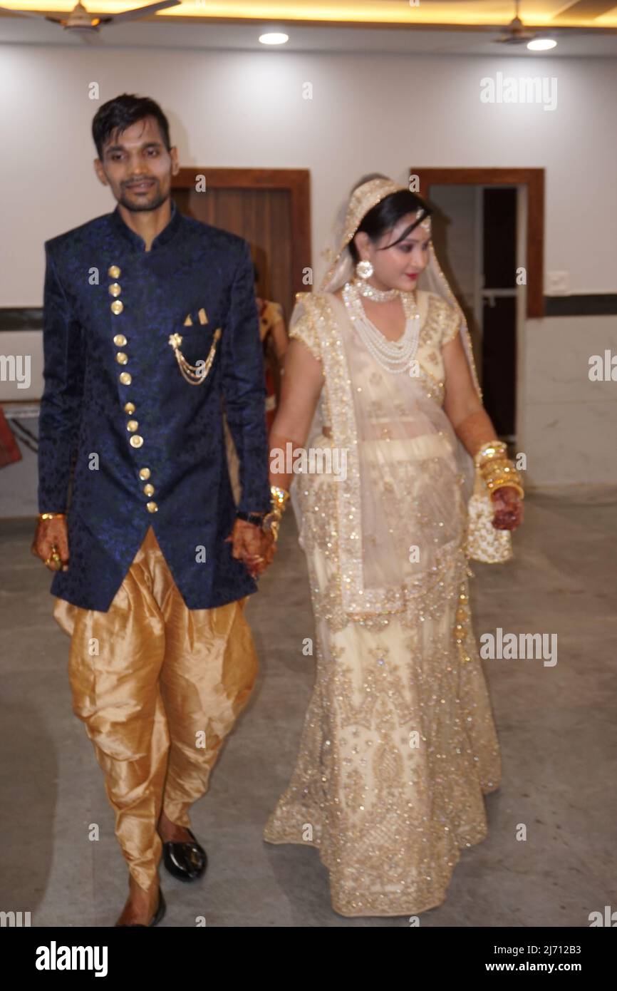 The traditional wedding of indian people is happening at the temple ...