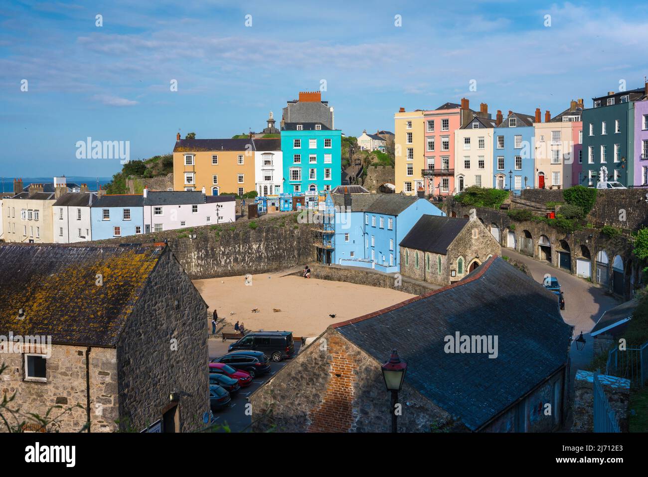 Wales travel, view of colourful historic property enclosing the small ...