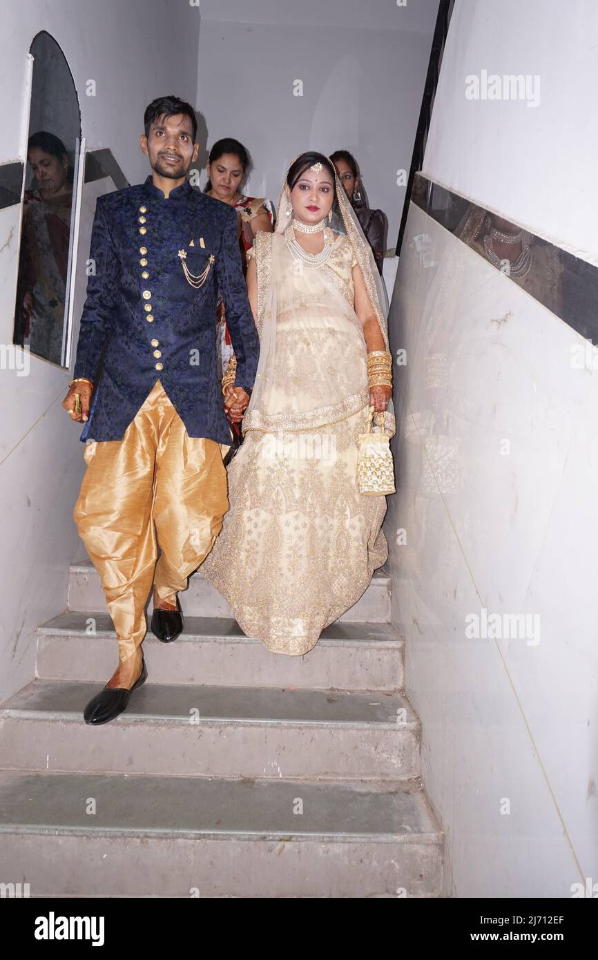 The traditional wedding of indian people is happening at the temple ...