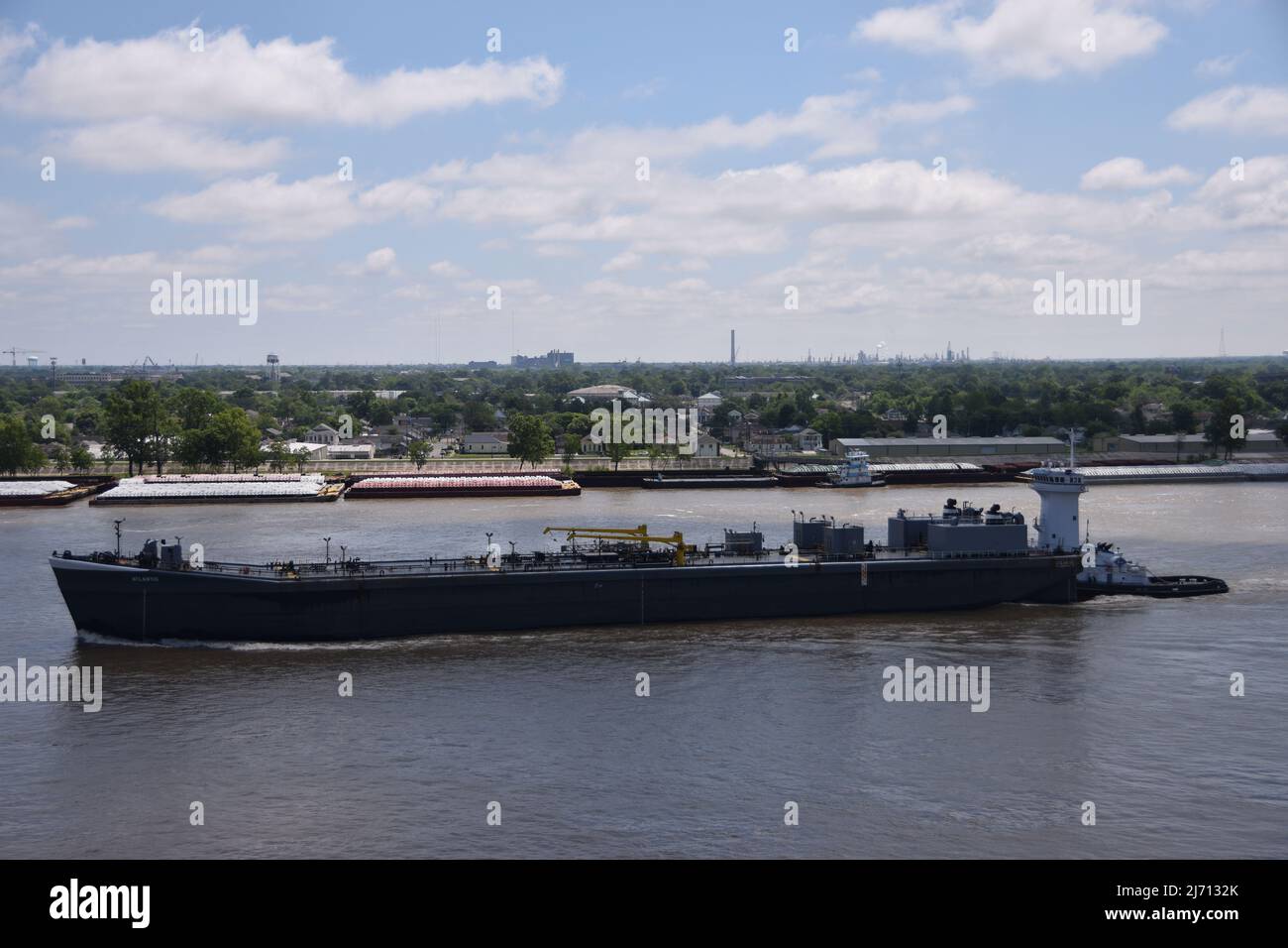 Barge Atlantic in New Orleans with Kirkby Tug Eliza on the Mississippi ...
