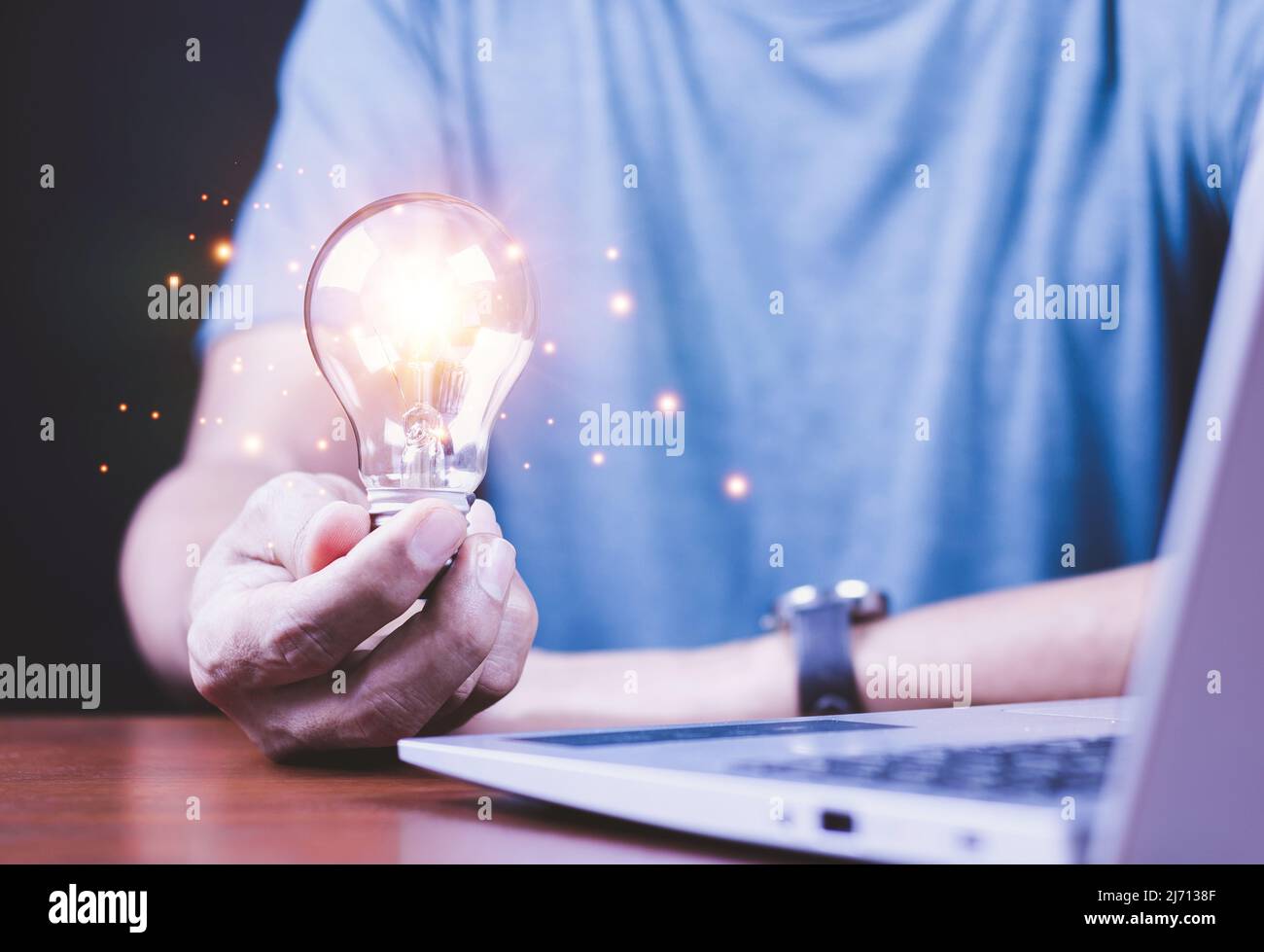 Man holding light hi-res stock photography and images - Alamy