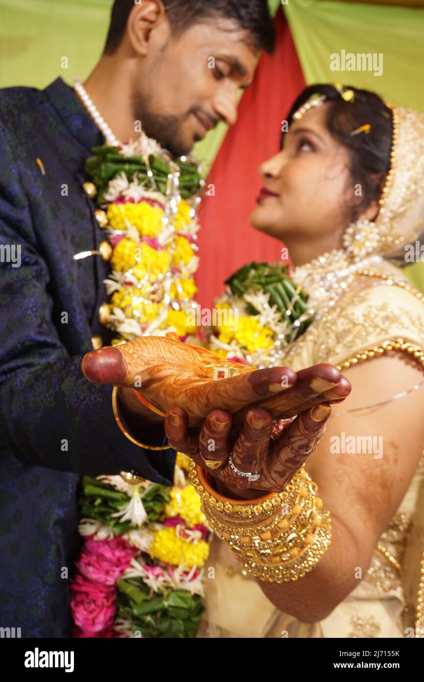 The traditional wedding of indian people is happening at the temple ...