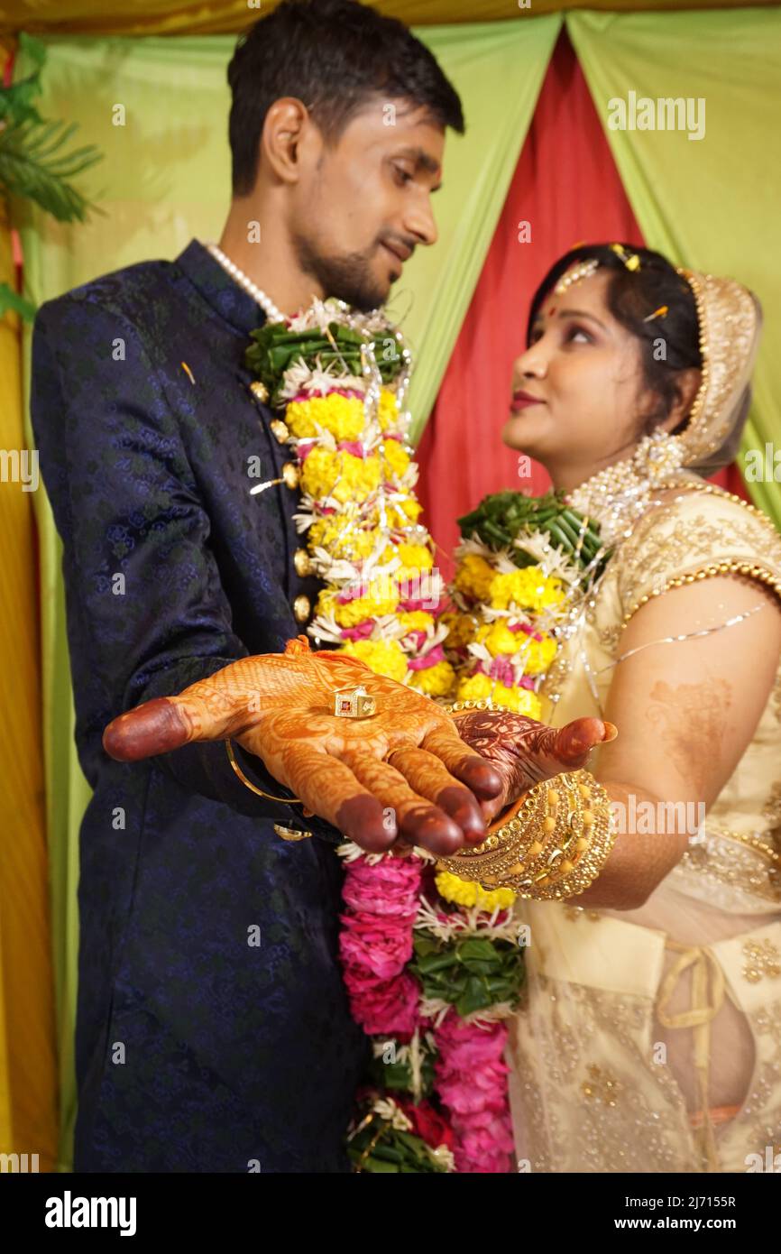 The traditional wedding of indian people is happening at the temple ...