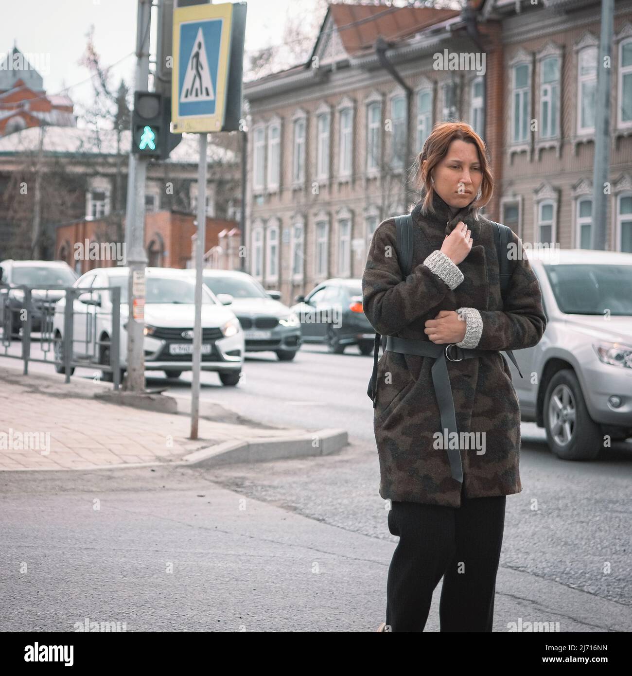 3rd of May 2022, Russia, Tomsk, sad pensive woman on the street Stock ...