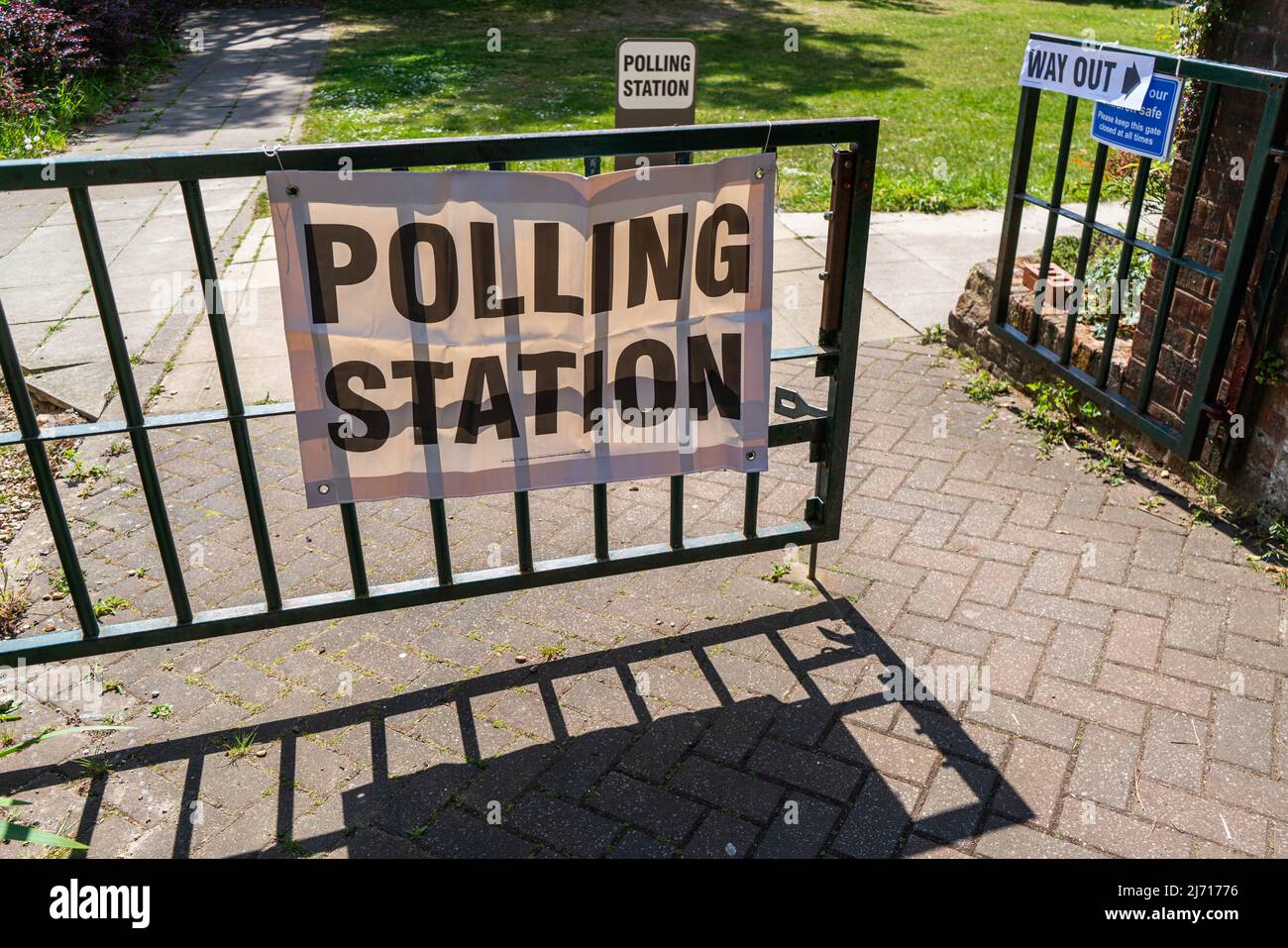 5 May 2022. A polling station sign attached to gate in London Stock ...
