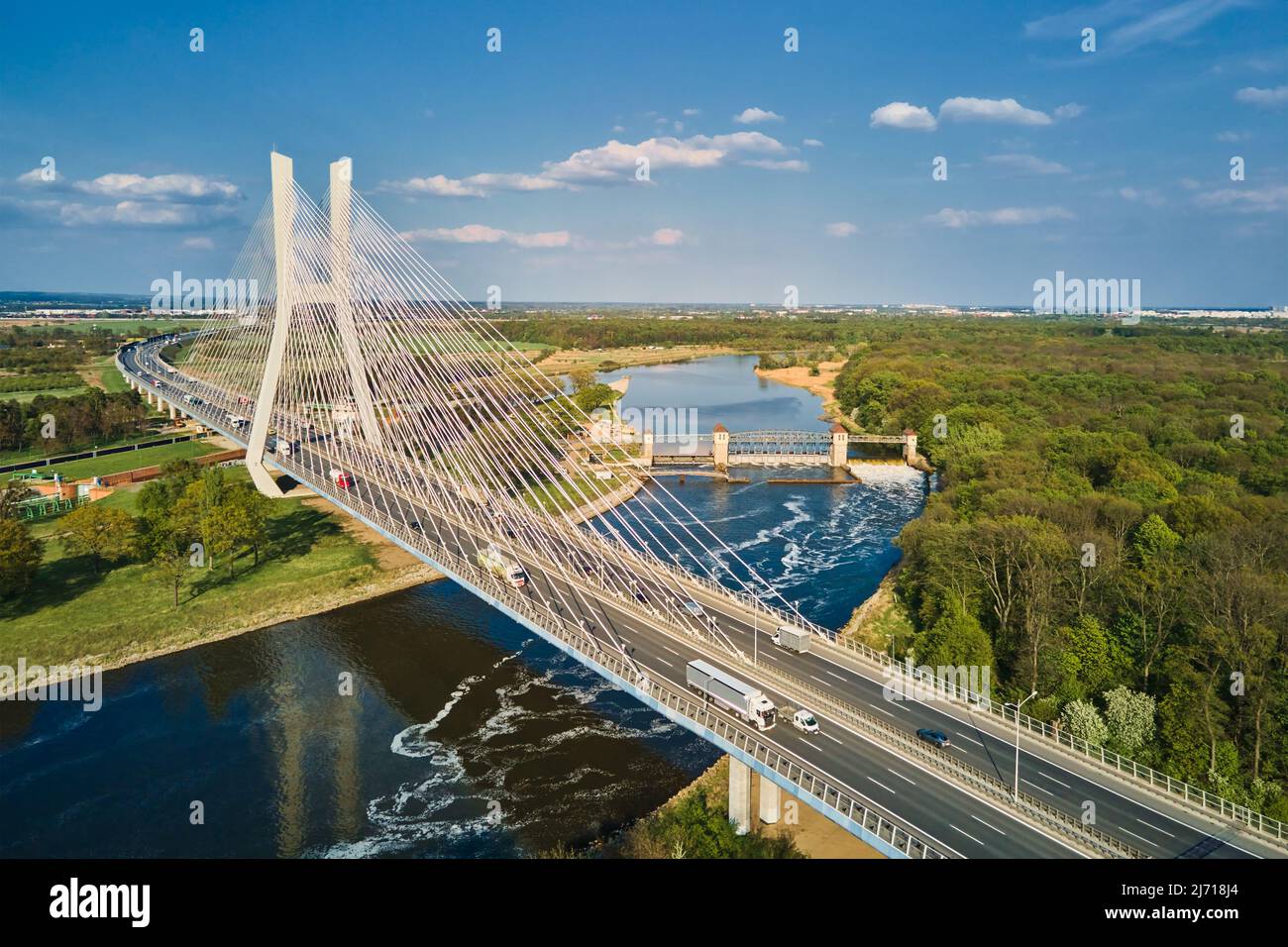 Large modern bridge over river in europe city with car traffic, aerial ...