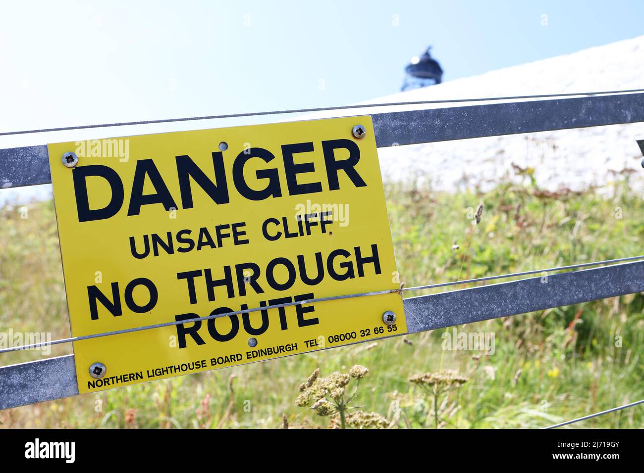 Danger unsafe cliffs warning sign Stock Photo - Alamy