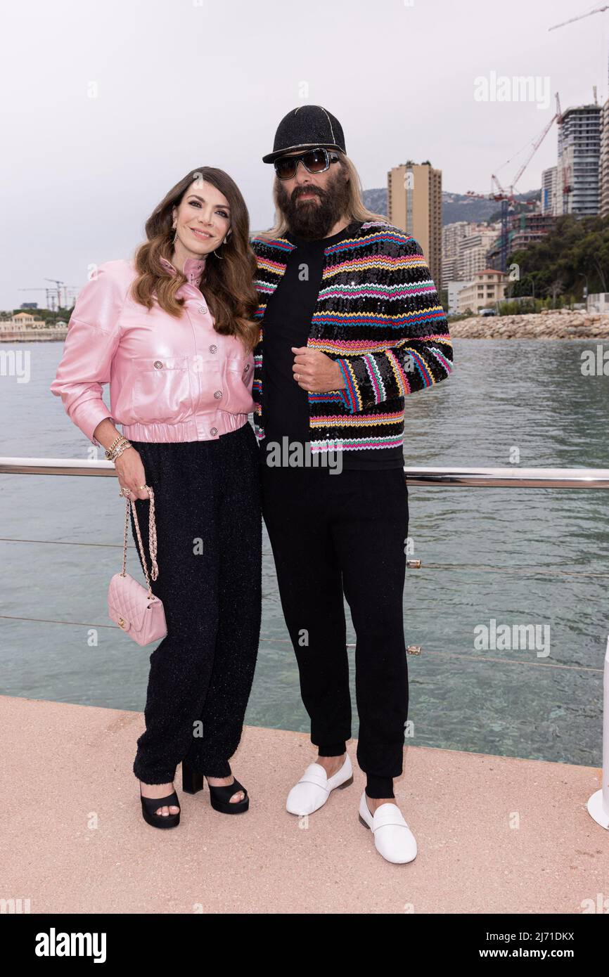Sebastien poses before the runway of Chanel Cruise Collection 2022-23 ...