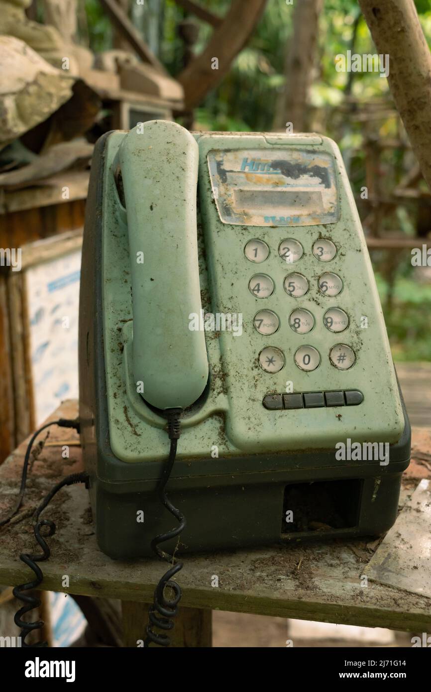 A broken home telephone in old vintage style from random abandoned ...