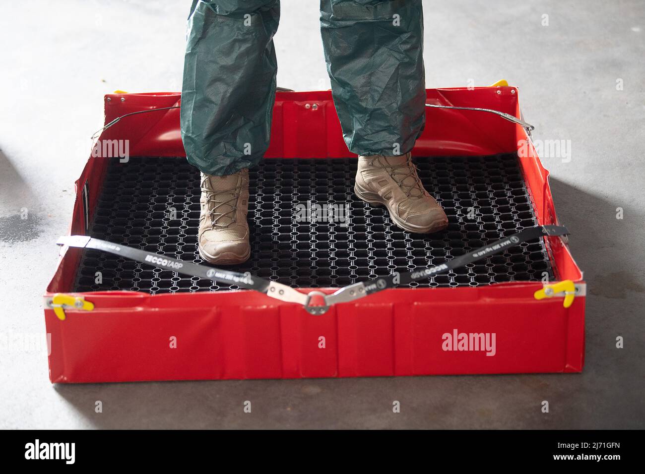 05 May 2022, Rhineland-Palatinate, Mainz: A police officer stands in a ...