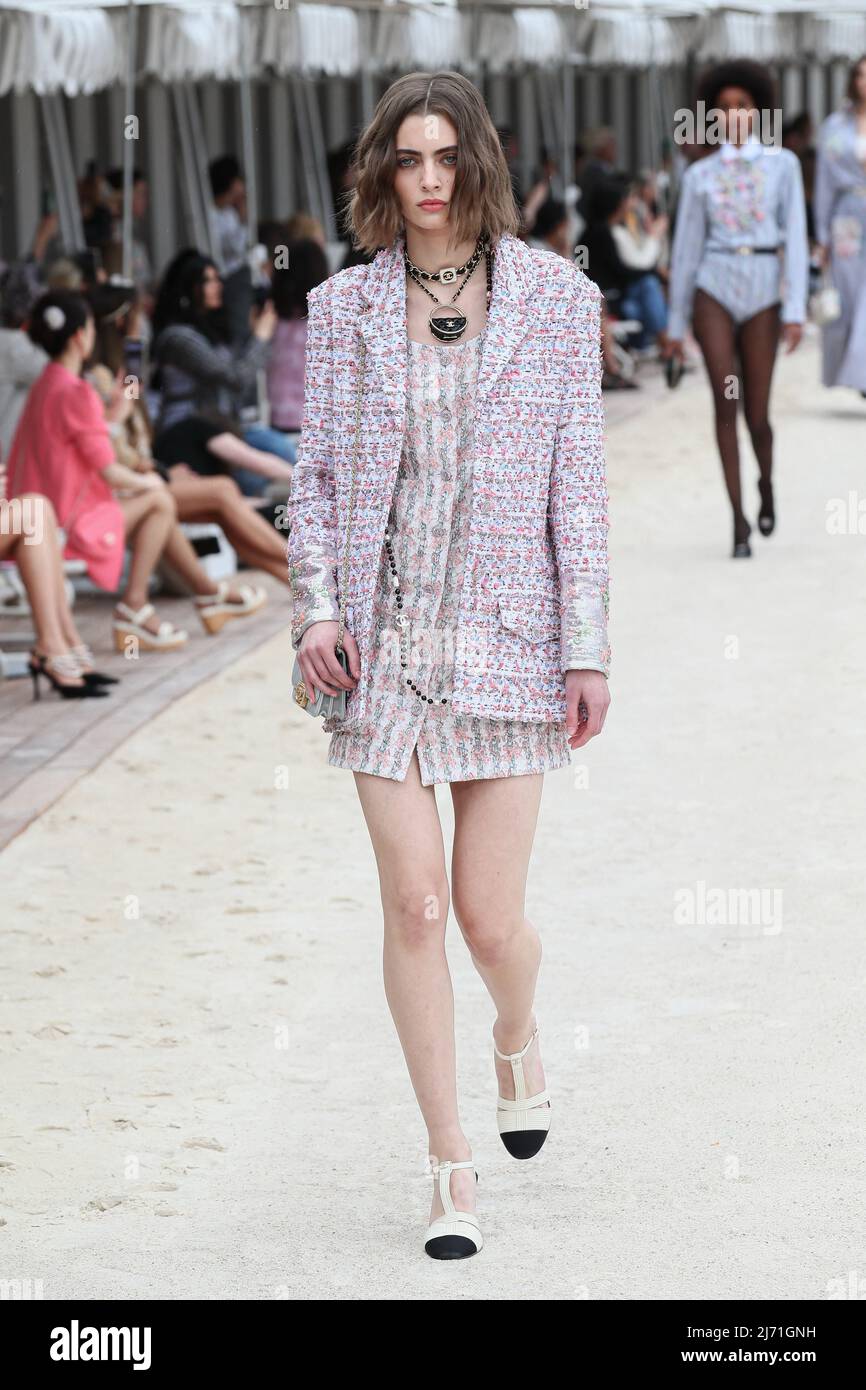 A model walks the runway during Chanel Cruise Collection 2022-23 held ...
