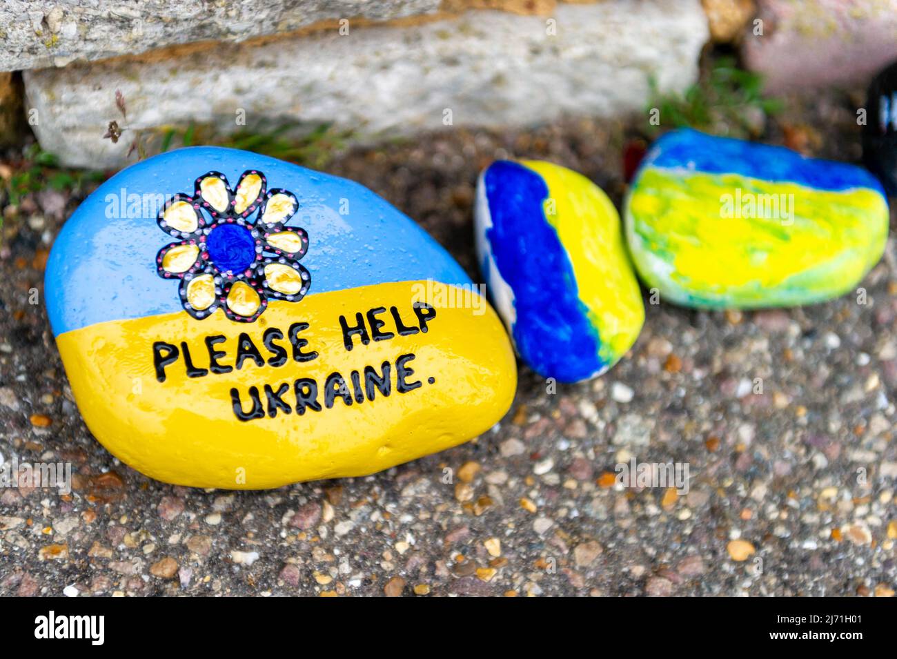 Help for Ukraine - Painted Stones Stock Photo - Alamy