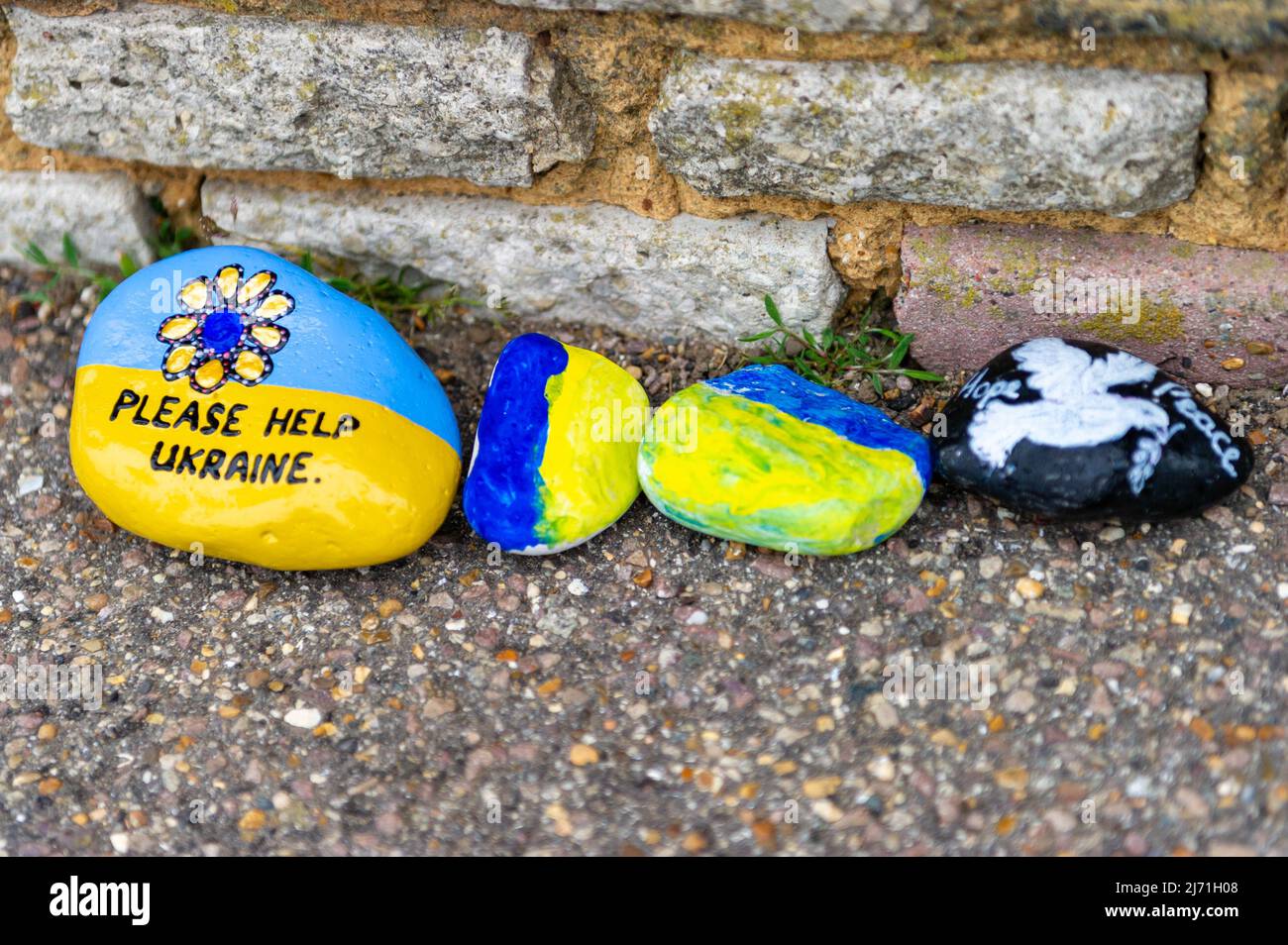 Help for Ukraine - Painted Stones Stock Photo - Alamy