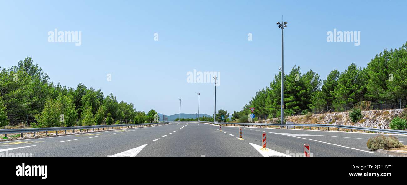 Scenic road. Road is surrounded by a magnificent natural landscape ...