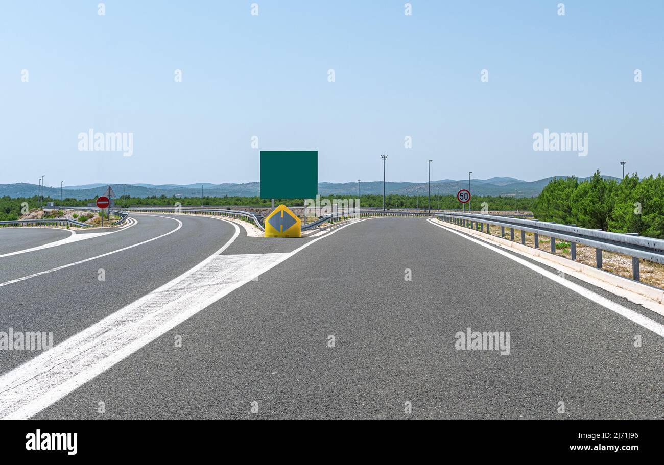 Scenic road. Road is surrounded by a magnificent natural landscape ...
