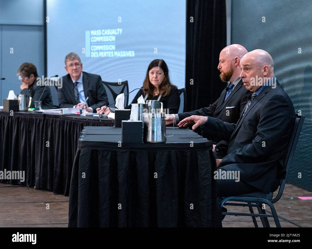 RCMP Const. Dave Melanson, right and Const. Terry Brown field questions ...