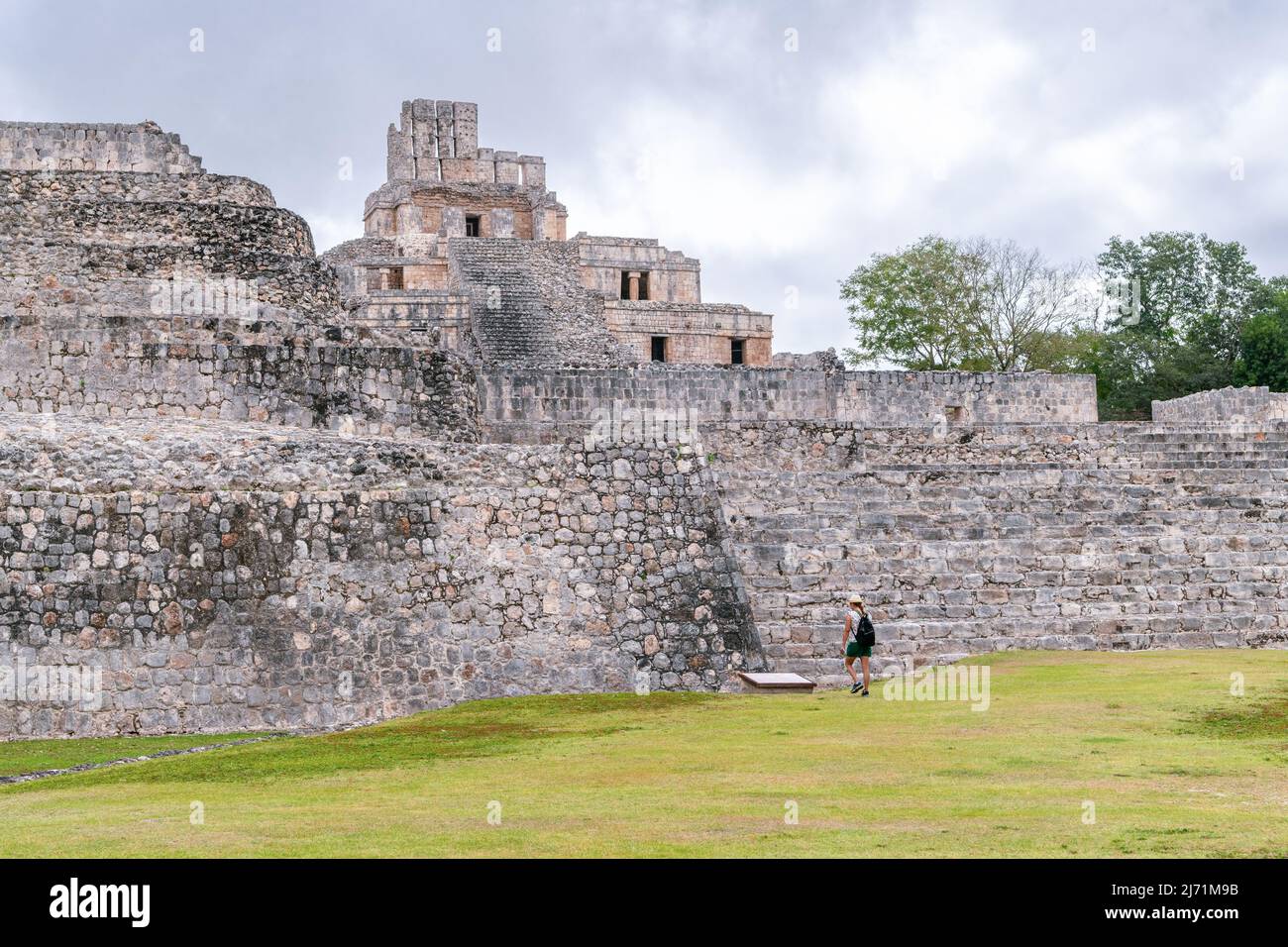 Woman exploring the mayan pyramid of Edzna (Temple of the Five Storeys ...