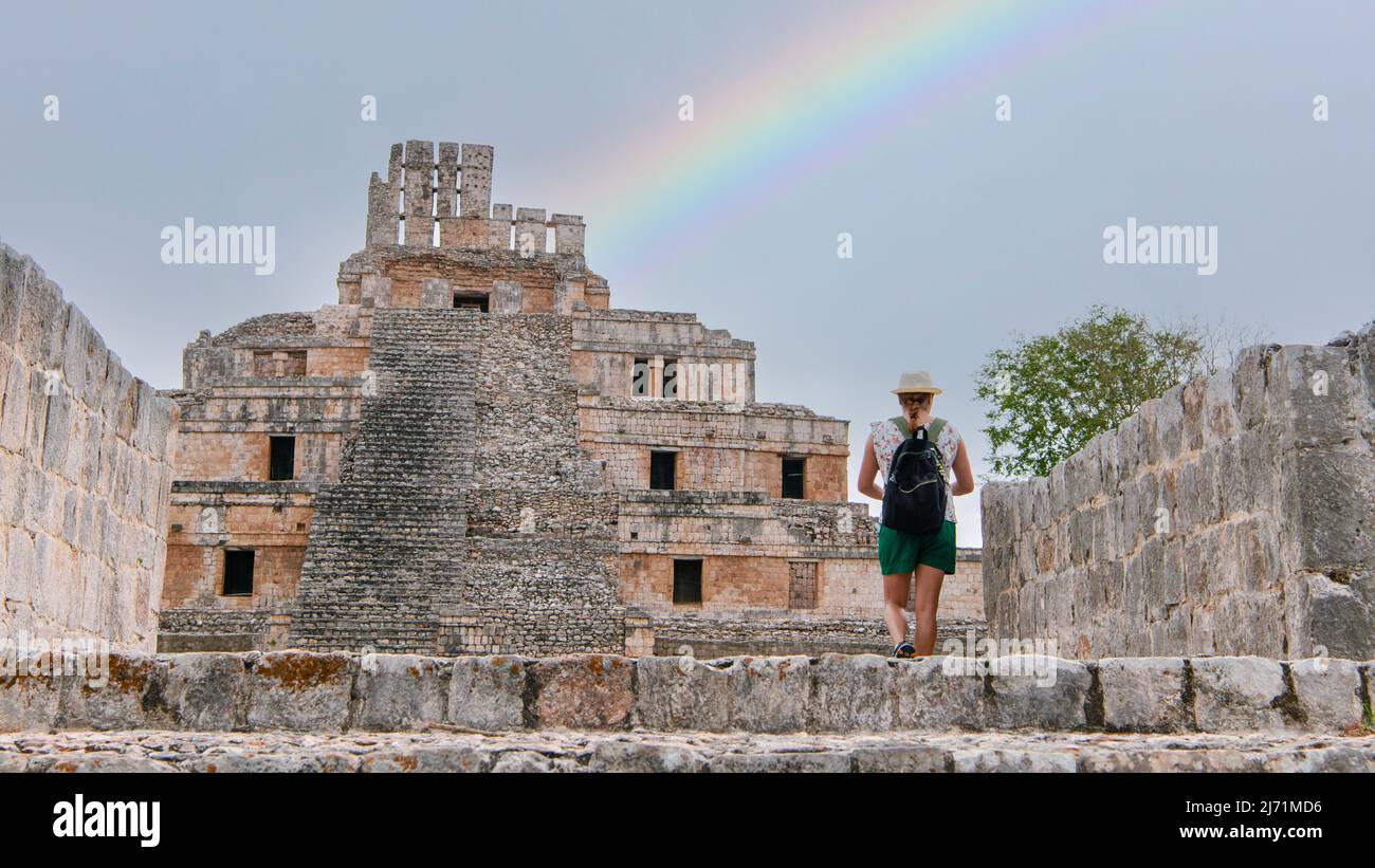 Woman exploring the mayan pyramid of Edzna (Temple of the Five Storeys ...