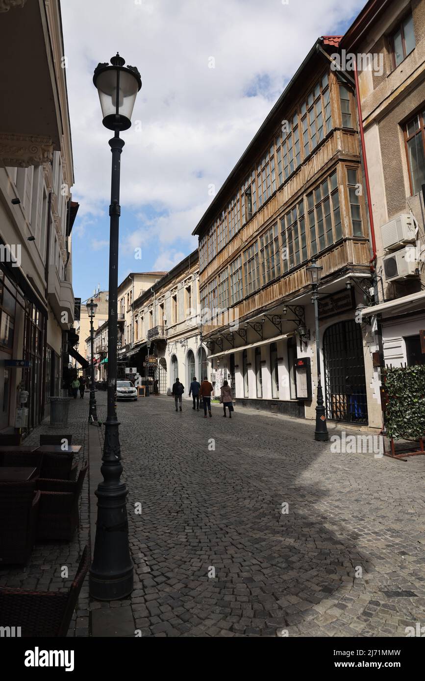 Historic wooden building in the Old Town of Bucharest, Romania; street ...