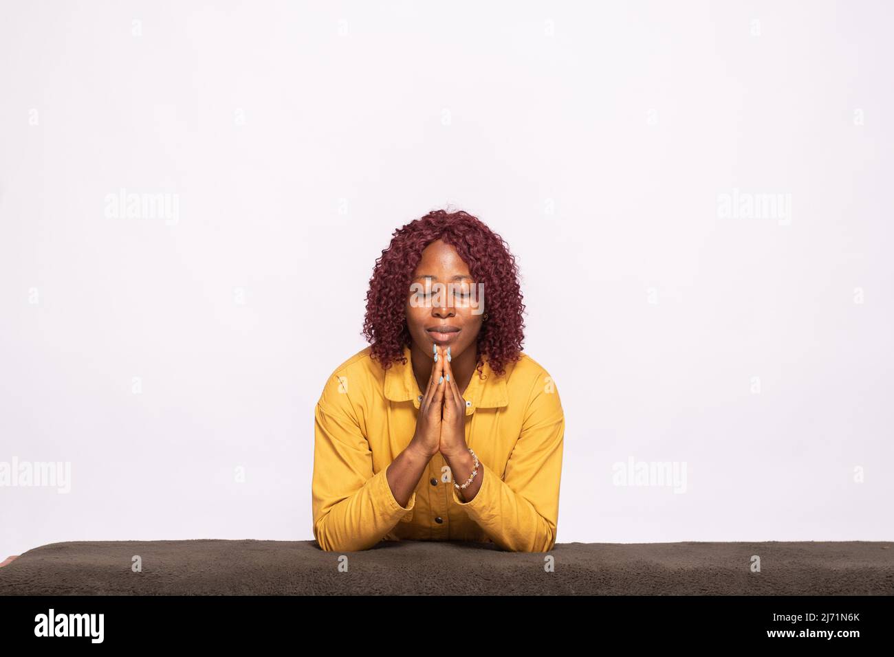 young african lady saying her prayers Stock Photo - Alamy