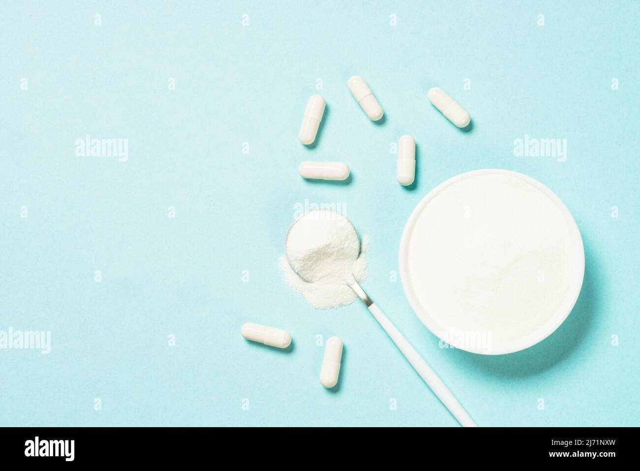 Collagen powder dietary supplement at blue Stock Photo - Alamy