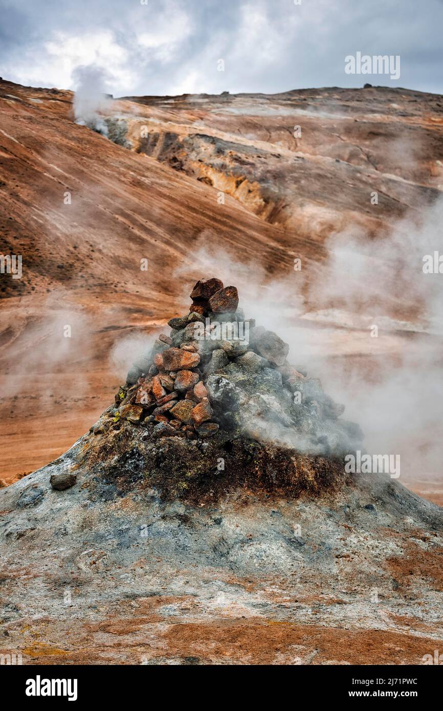 Steaming fumarole, Solfatar in front of ridge Namafjall, geothermal ...