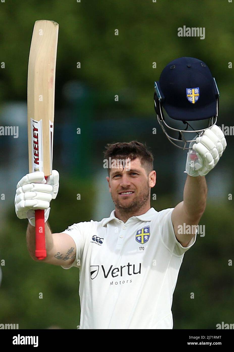 Durham's Sean Dickson celebrates after reaching his century during the ...