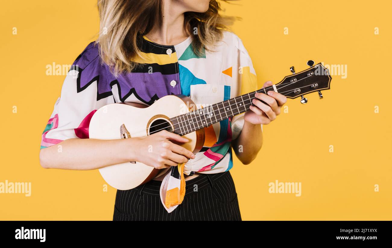 girl playing ukelele Stock Photo - Alamy