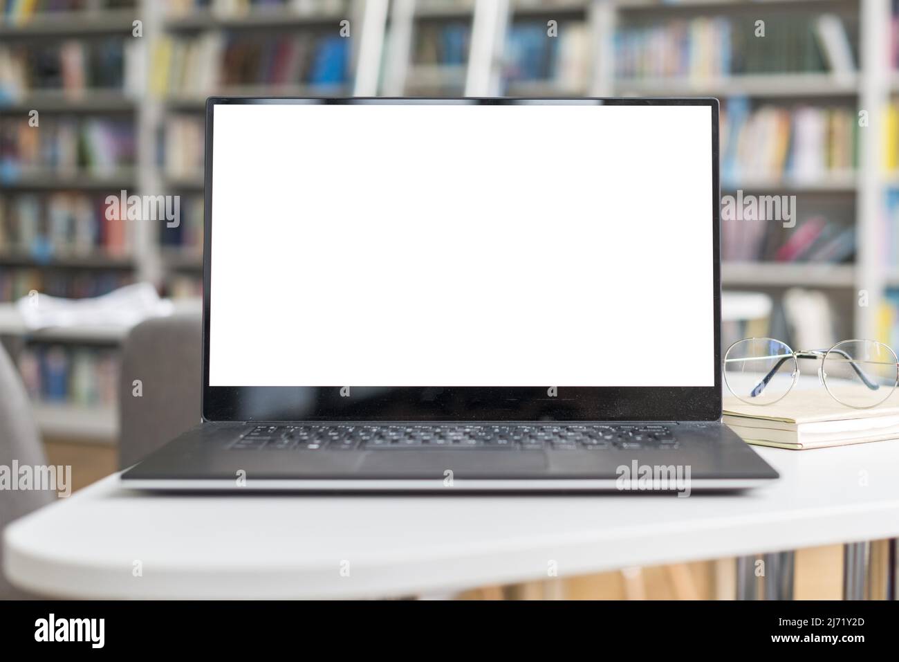 laptop with empty screen, library Stock Photo - Alamy