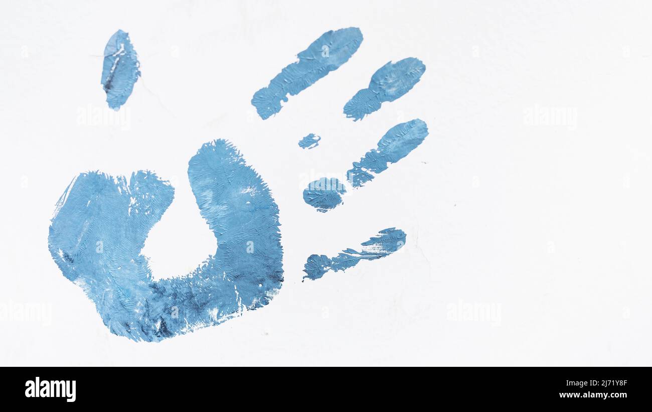 Acrylic blue human palm print isolated white background Stock Photo - Alamy