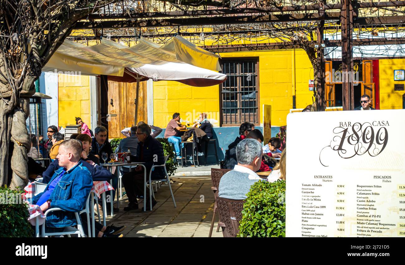 Outdoor cafe 1899 Bar Casa, We Love Granada Market. Popular Sunday ...