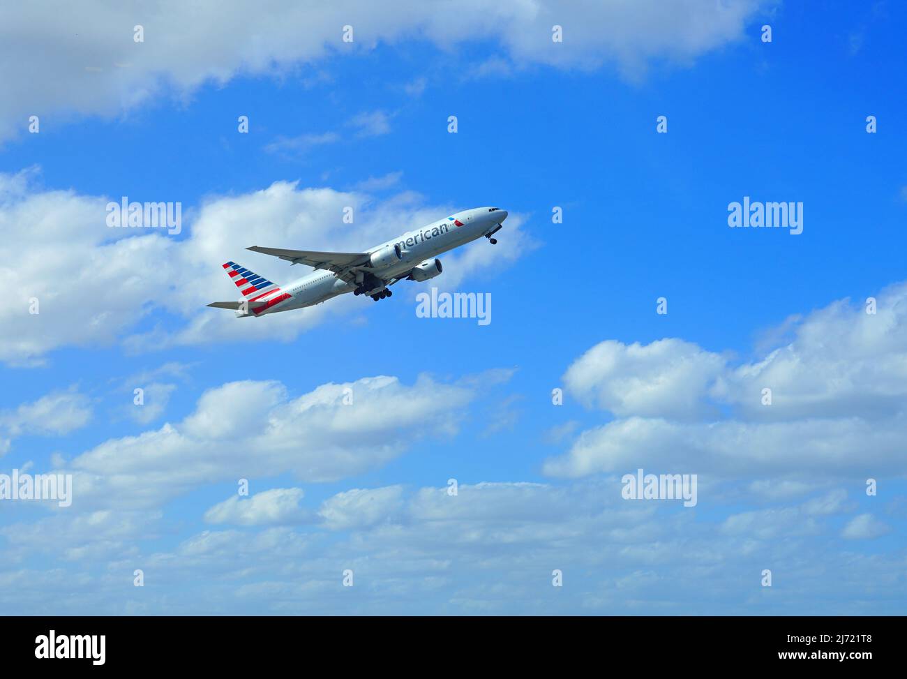 MIAMI, FL -13 MAR 2022- View of an airplane in flight from American ...