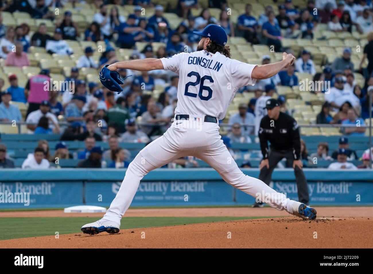 Los Angeles Dodgers relief pitcher Tony Gonsolin (26) throws during a ...
