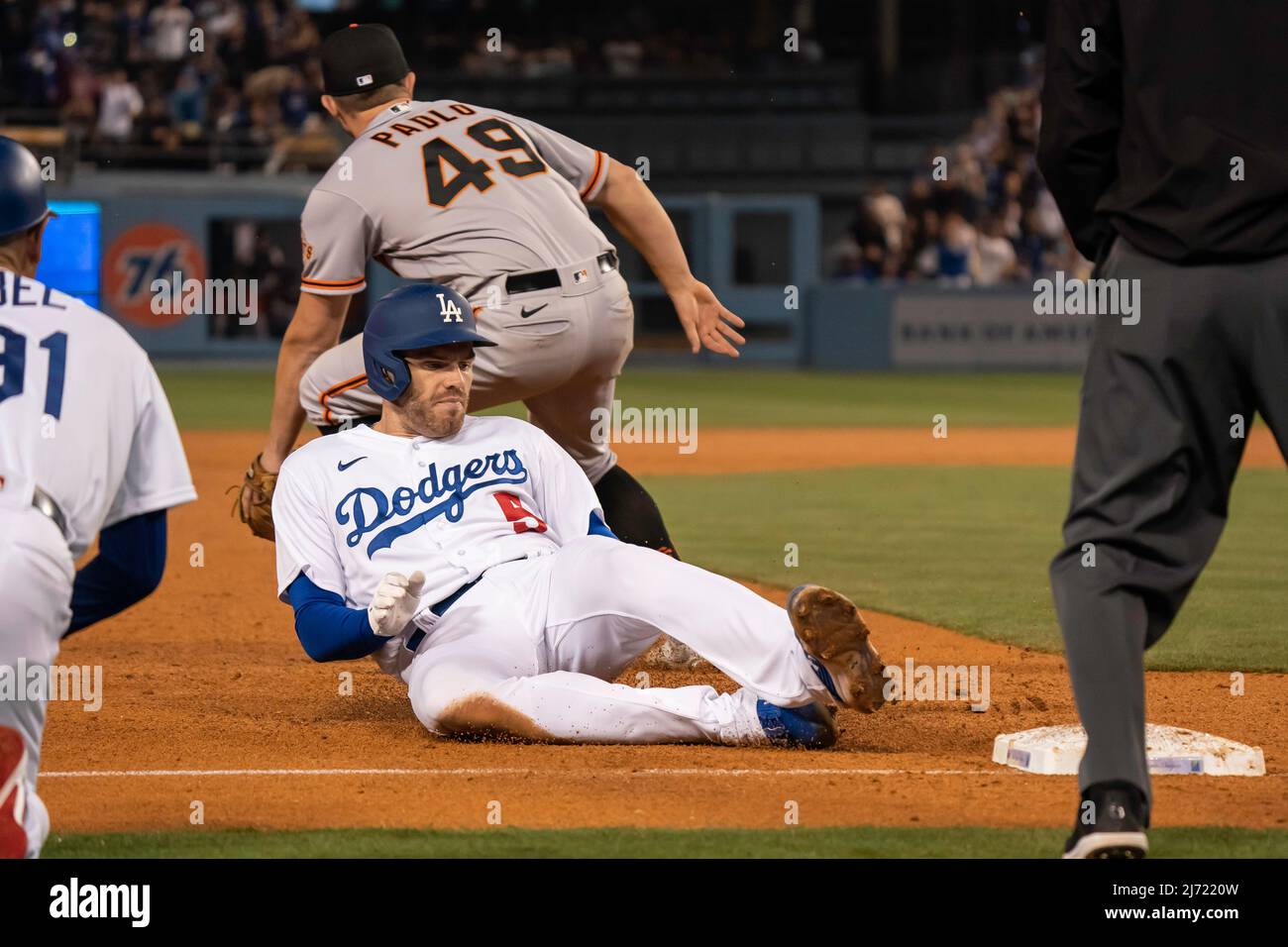 Los Angeles Dodgers first baseman Freddie Freeman (5) slides into third ...