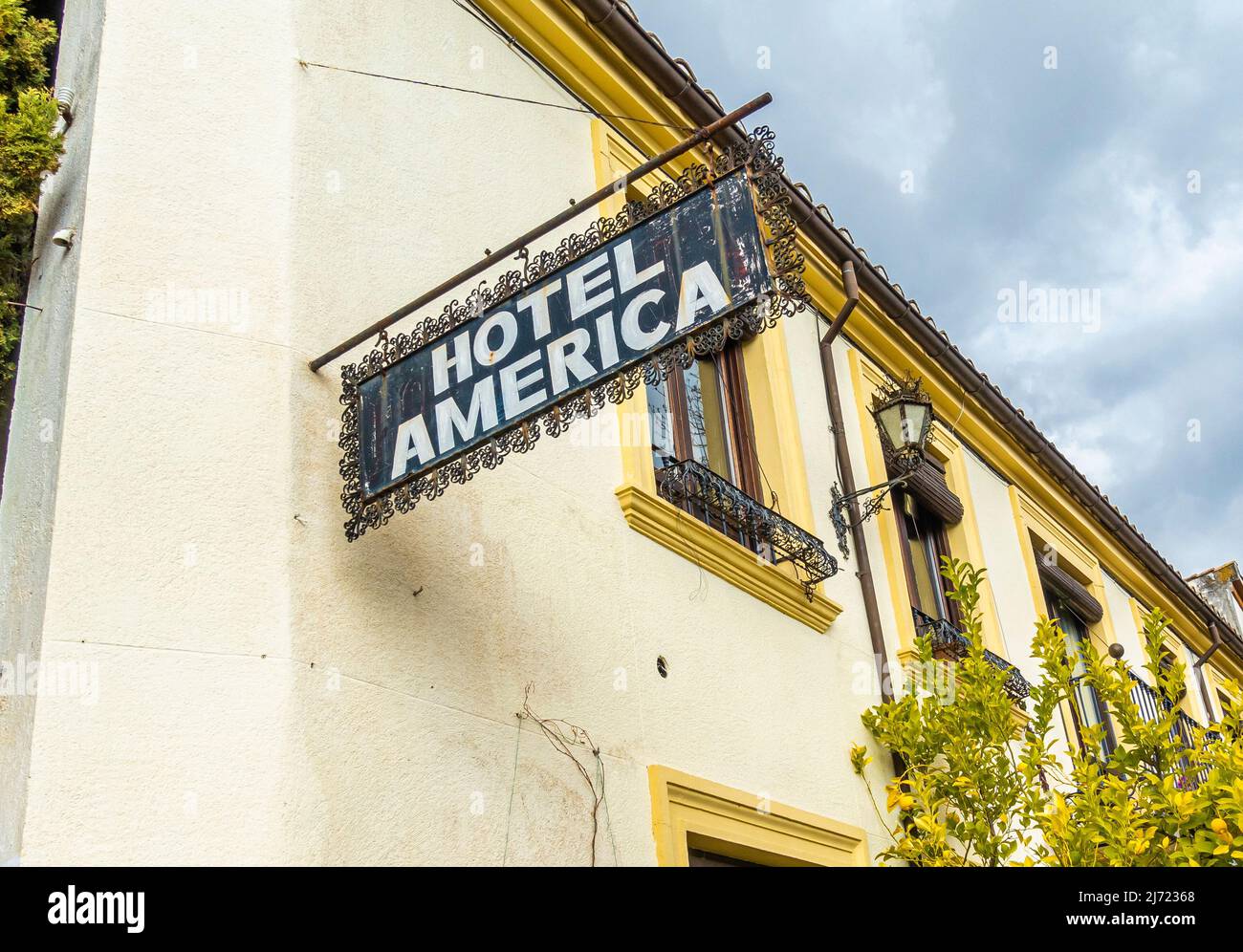 Sign of Hotel America Granada. Historic hotel in a 19th-century ...