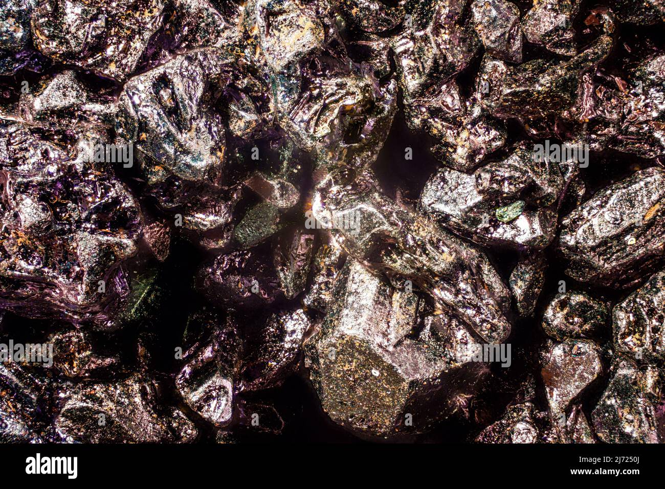 Potassium permanganate crystals under 4x magnification microscope ...