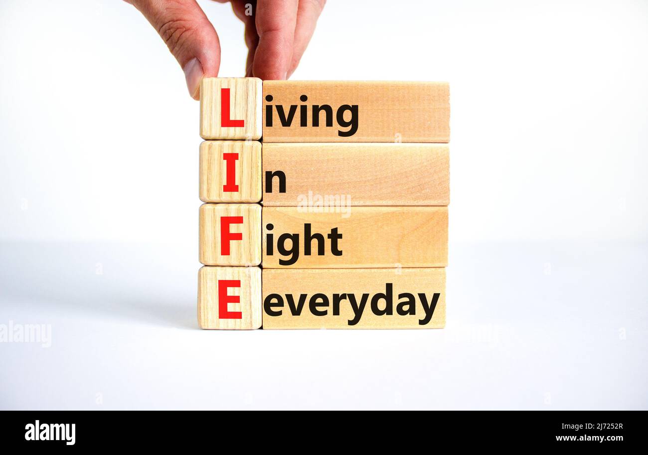 LIFE living in fight everyday symbol. Concept words LIFE living in ...