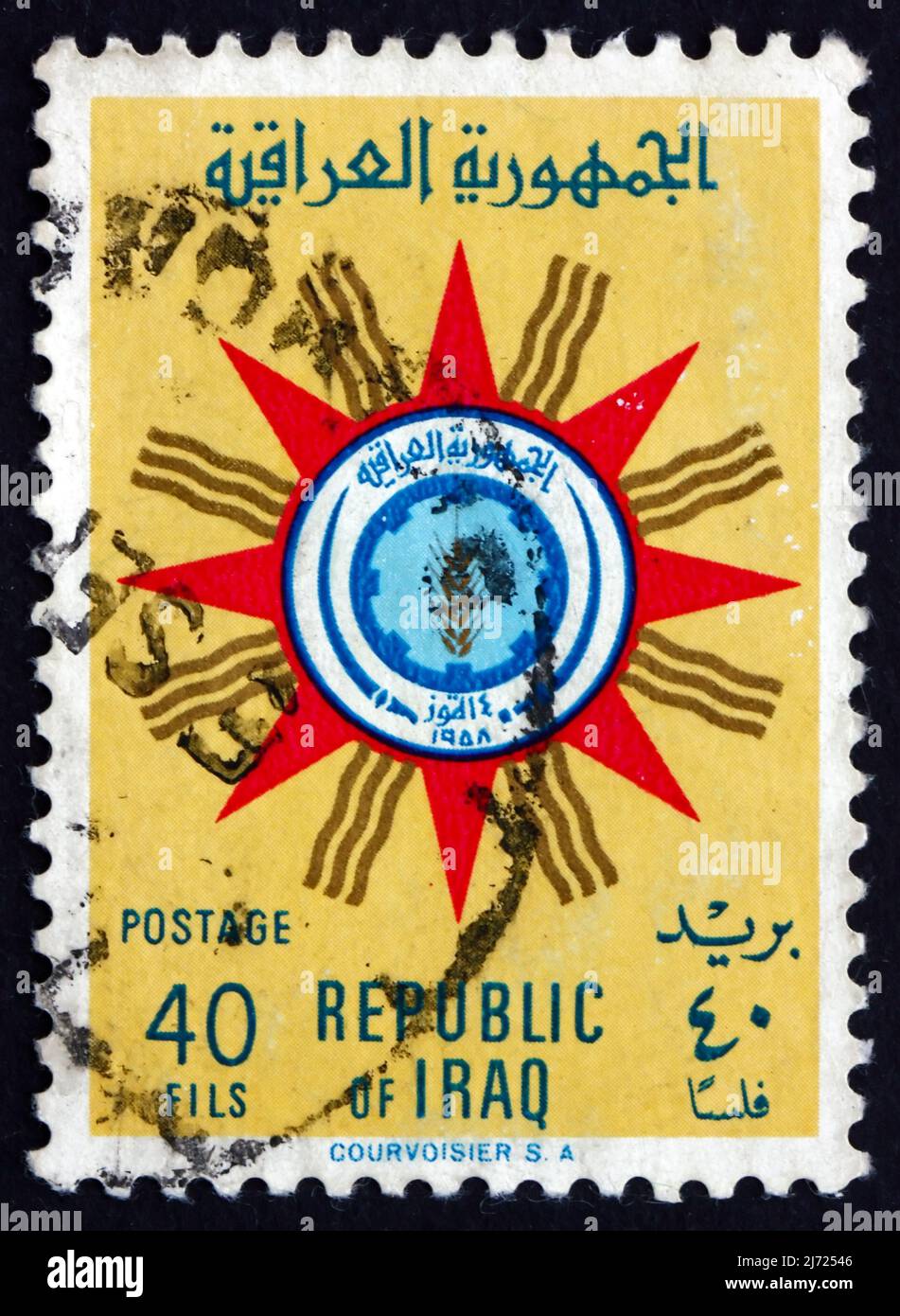 IRAQ - CIRCA 1959: a stamp printed in the Iraq shows Emblem of Republic ...