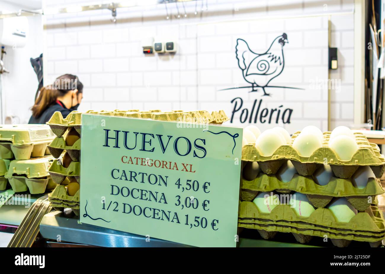 Huevos egg eggs xl on display with price tag poster, Polleria stall ...